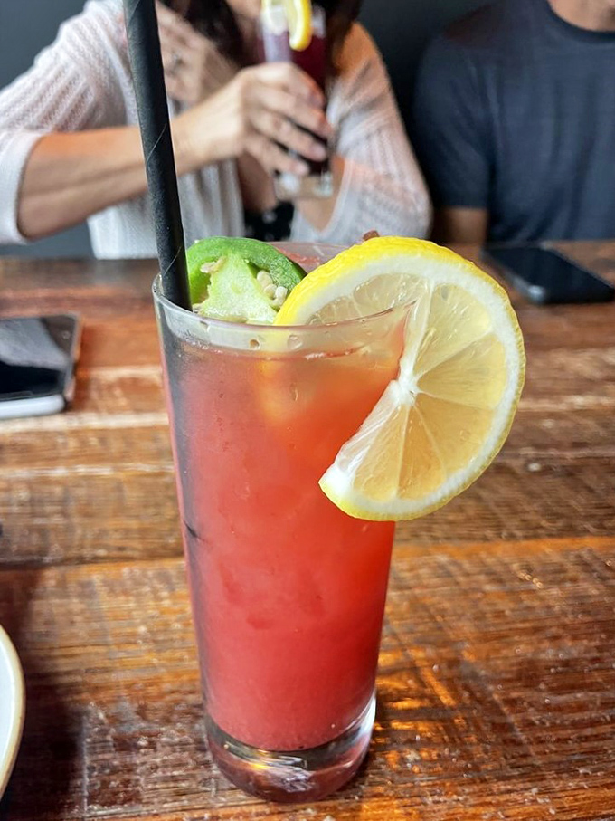 This isn't just a cocktail; it's summer in a glass with a slice of citrus optimism. The kind of drink that makes you temporarily forget about Cleveland winters.