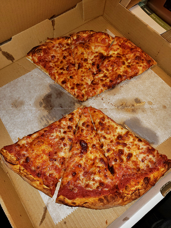 Cheese pizza perfection that makes you question why you ever complicate things with toppings. Sometimes, less truly is more.