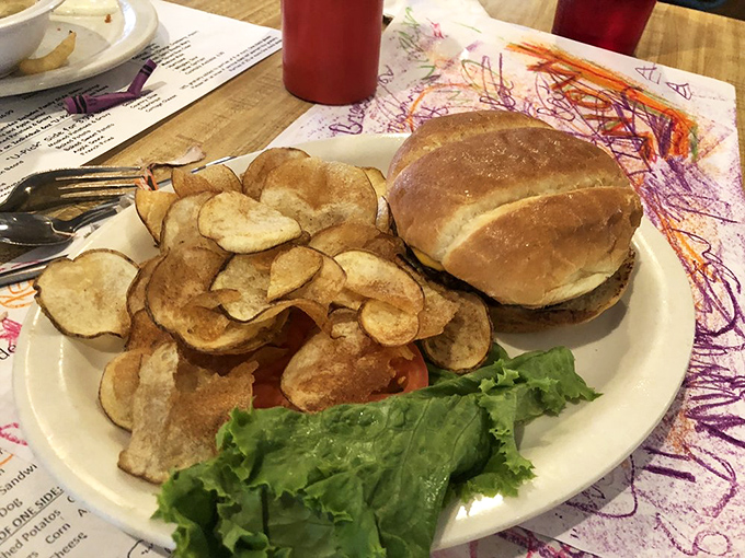 This isn't just a burger with homemade chips—it's what happiness looks like after a morning of farm activities.