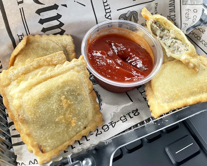 These aren't your nonna's ravioli&mdash;they're her rebellious grandchildren who went to culinary school. Crispy, saucy perfection in bite-sized form.