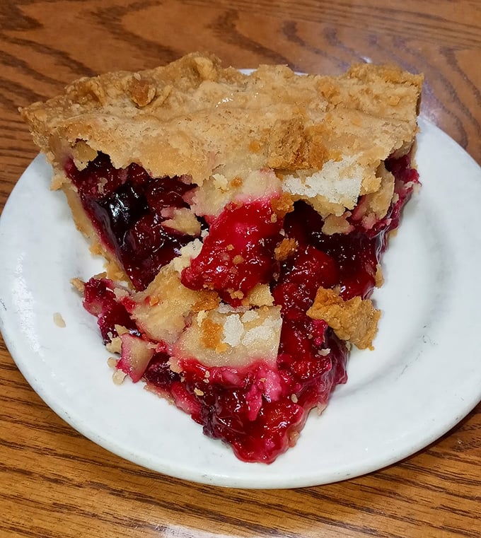 Berry filling erupts from flaky crust like nature's lava&mdash;this slice of cherry pie demands to be savored, not just eaten.