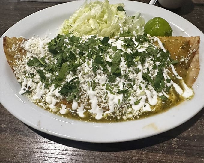 Chicharron quesadilla with a blanket of fresh greens. When crispy meets creamy, beautiful things happen on a plate.