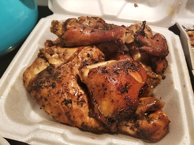 Smoked chicken wearing its char marks like badges of honor, proof of time well spent over real wood.