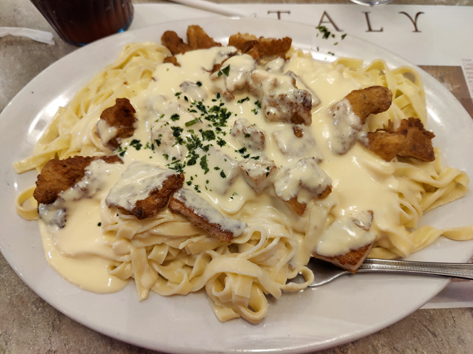 Fettuccine Alfredo so creamy it should come with its own cardiologist's business card&mdash;but some pleasures are worth the risk.