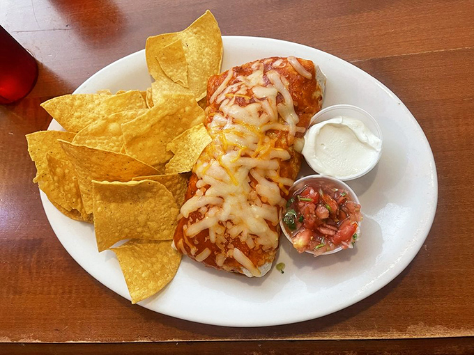 A burrito that's achieved celebrity status, draped in melted cheese and flanked by tortilla chips. The perfect handheld meal for those who prefer forks anyway.