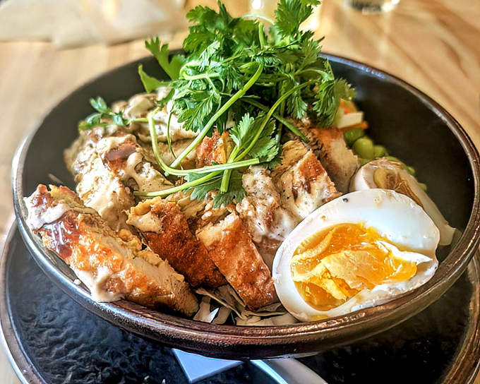 Not just chicken and rice&mdash;it's a bowl of comfort crowned with a perfectly soft-boiled egg that's basically nature's sauce packet.