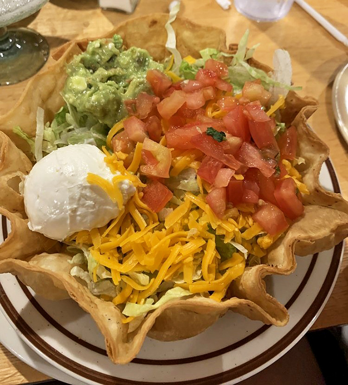 Not just a salad bowl&mdash;it's an edible stadium where fresh ingredients play the most delicious game in town. That sour cream dollop is the MVP.