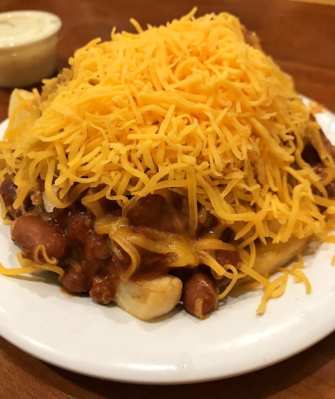 Chili cheese fries that laugh in the face of diet plans &ndash; a mountain of comfort that says "today is not the day for moderation."