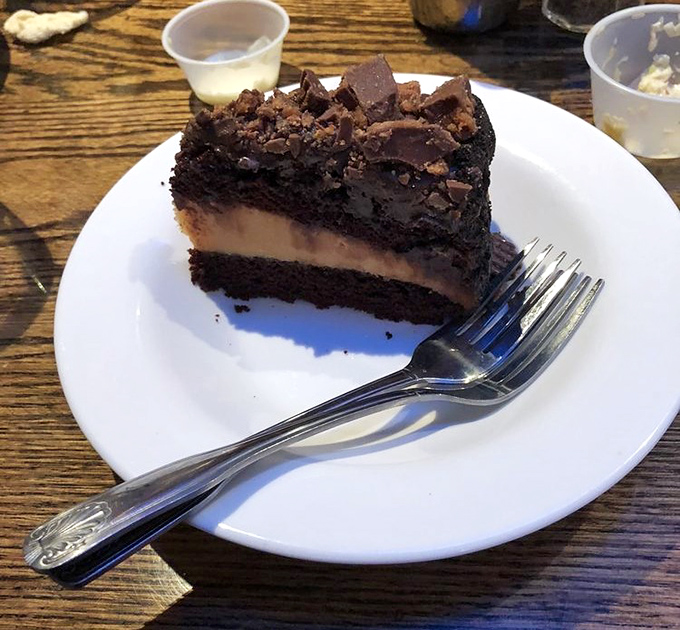 When seafood fatigue sets in (as if), this chocolate peanut butter cake steps up as the perfect finale to your maritime feast.