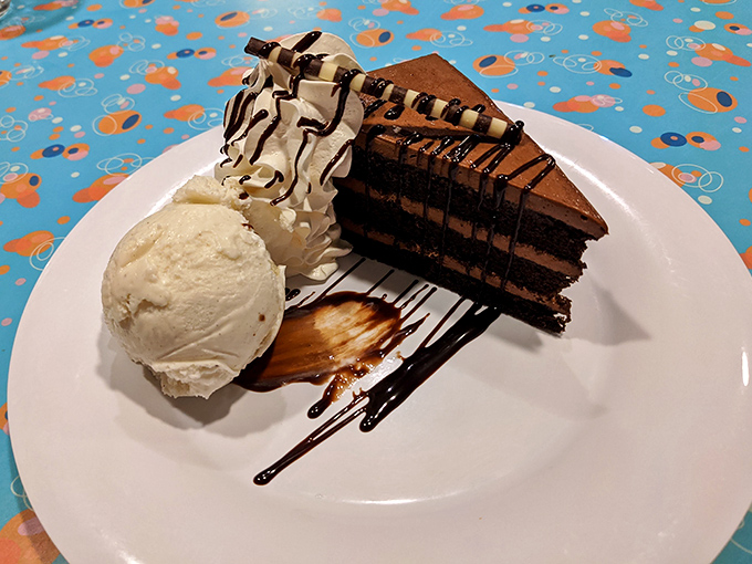 Chocolate cake that makes you understand why people in the '50s were so optimistic. That scoop of vanilla ice cream is just showing off.