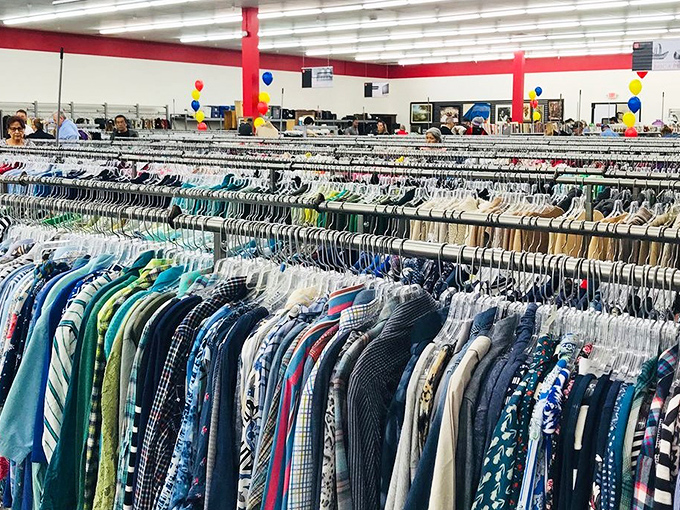 Ocean of options: The clothing section stretches as far as the eye can see, like a rainbow of second chances hanging neatly in a row.