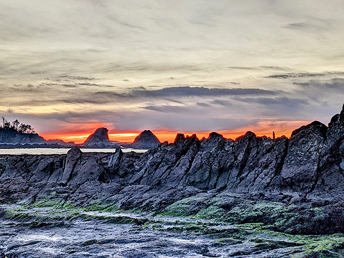 Sunset painting the rocks in colors that would make even Bob Ross exclaim, "Now that's a happy little accident!"