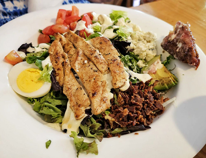 A Cobb salad that doesn't just sit there looking pretty&mdash;it demands your attention with perfectly grilled chicken, crispy bacon, and that egg bringing it all together.