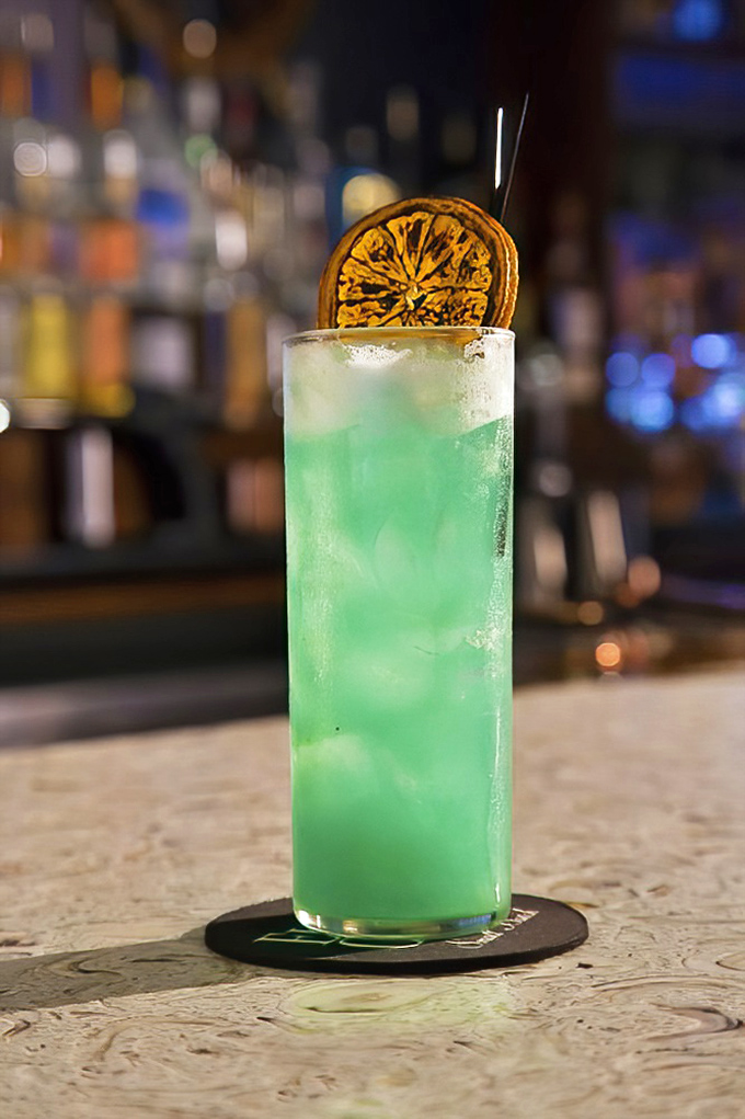 This isn't just a cocktail&mdash;it's a beachside vacation in a glass, with that dehydrated citrus garnish serving as both decoration and a hint of what's to come with each sip.