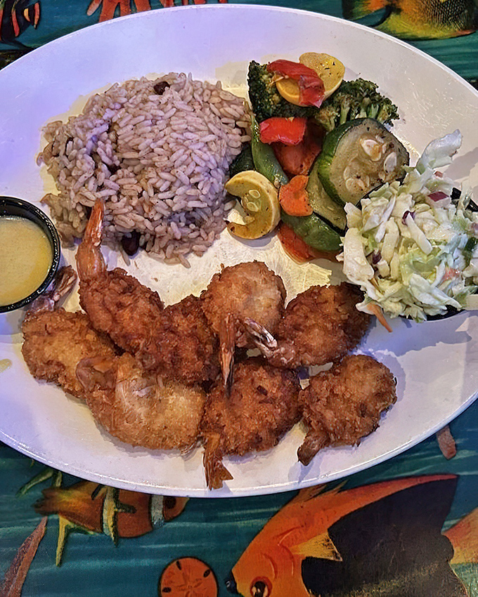 Coconut shrimp arrive like little life rafts of flavor, ready to rescue you from the sea of mediocre mall food options.
