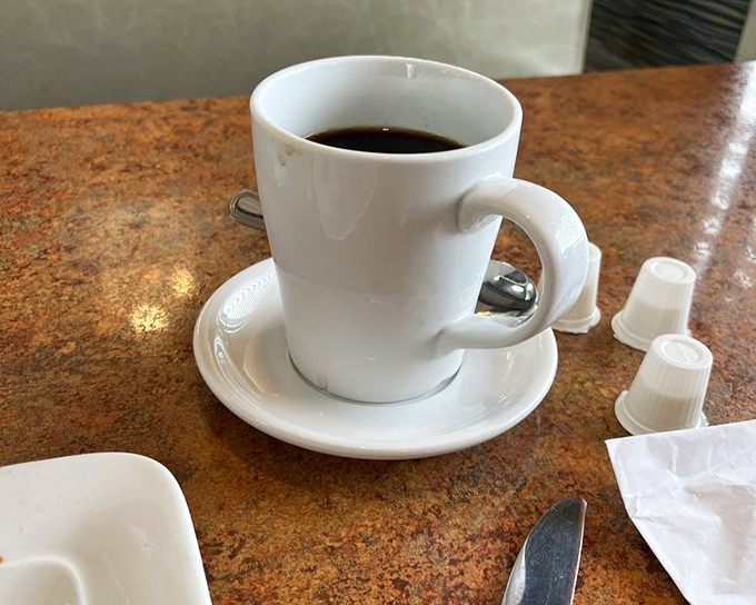 Sometimes the simplest pleasures are best: a perfect cup of coffee served in a sturdy white mug, ready to fuel your day.