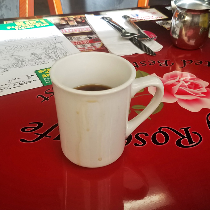 The humble coffee mug, unsung hero of breakfast adventures. Simple, sturdy, and ready to fuel your day at Country Rose.