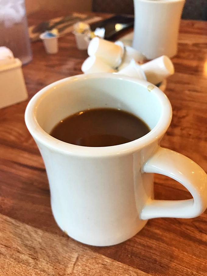 A simple white mug of coffee &ndash; the unsung hero of every great breakfast. No foam art needed when the brew speaks for itself.