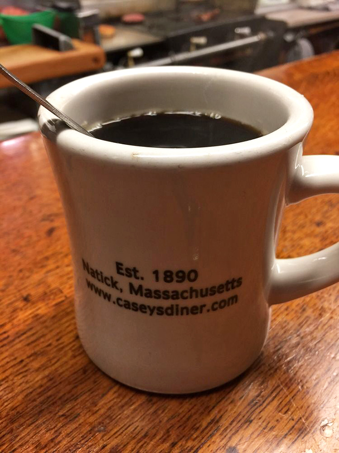 Coffee served in a mug that's seen more Massachusetts mornings than most meteorologists. Simple, strong, and completely necessary.