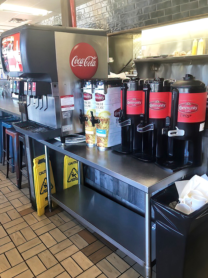 The coffee station&mdash;where morning dreams begin. Those Community Coffee urns promise the liquid courage needed to face the day.