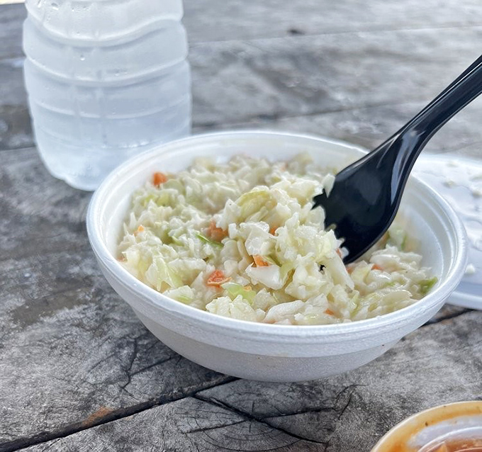 Coleslaw that knows its supporting role: creamy enough to complement the smoke without drowning in mayo&mdash;barbecue's perfect dance partner.