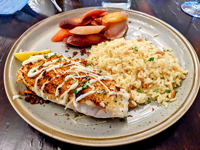 A plate that proves sometimes the simplest preparations create the most profound flavors &ndash; perfectly seasoned fish, thoughtful sides, and not a wasted centimeter.