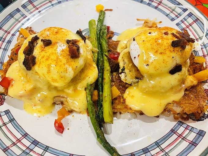 Eggs Benedict with crab cakes instead of English muffins? Whoever thought of this deserves a Nobel Prize in Breakfast Innovation.