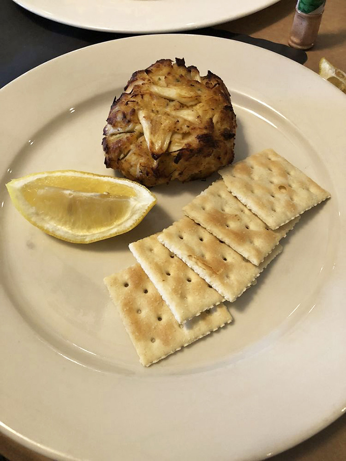 The quintessential Maryland crab cake &ndash; a golden-brown monument to minimalism where crab is the star and fillers know their place.