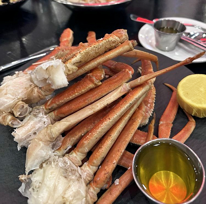 Crab legs arranged like nature's perfect eating puzzle &ndash; the only food that gives you tools, a workout, and satisfaction all in one package. 