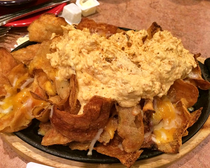 Crabby Chips&mdash;where house-made potato chips meet crab dip in a relationship that was clearly meant to be. True love at first bite!