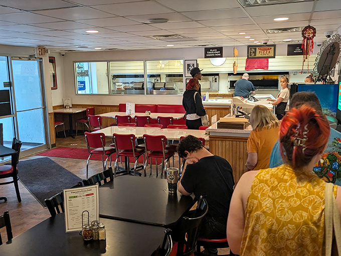 Where pizza memories are made. The best conversations happen over a table with a Vinnie Pie at the center.