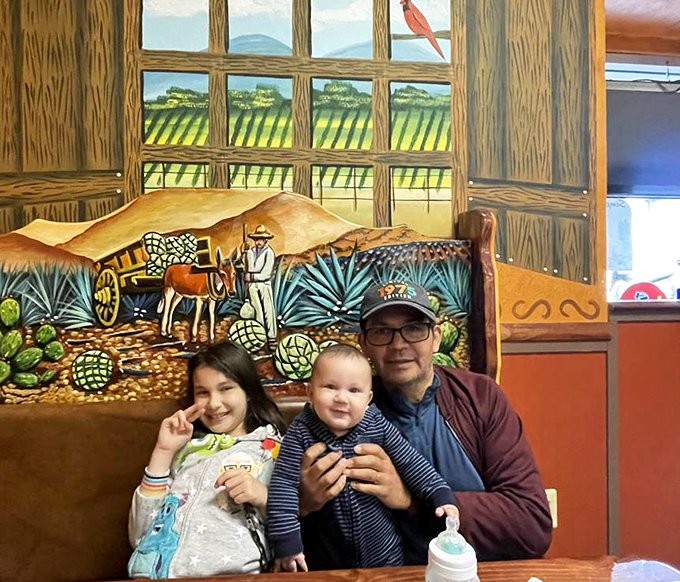 Family memories are made in booths like these, with murals telling stories of agricultural heritage and agave landscapes. The backdrop to countless celebrations.