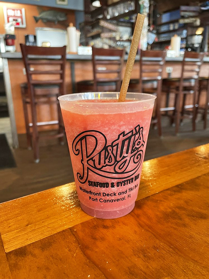 A frosty strawberry daiquiri that captures the essence of Florida in a glass – refreshing, colorful, and just the right amount of sweet.
