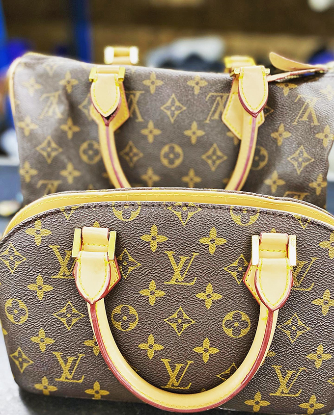 Designer dreams at down-to-earth prices. These Louis Vuitton bags represent the ultimate thrift store jackpot&mdash;luxury finds hiding among everyday treasures.