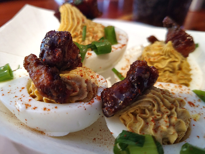Deviled eggs elevated to art form&mdash;topped with burnt ends that make you question why all deviled eggs aren't finished this way.