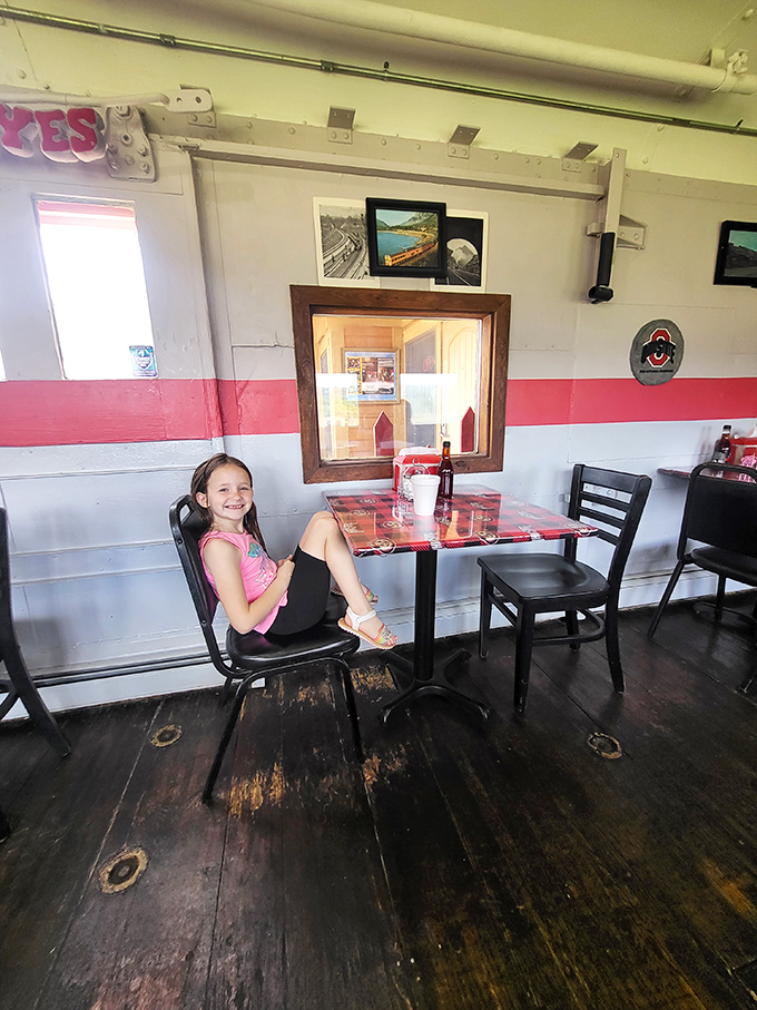 Every inch tells a story in this narrow dining car. The wooden floors have carried thousands of hungry visitors, each leaving with full bellies and train tales.