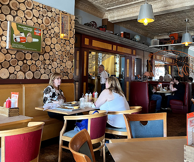 The wood-paneled walls and vintage d&eacute;cor create the perfect backdrop for what truly matters: friends, family, and food worth lingering over.