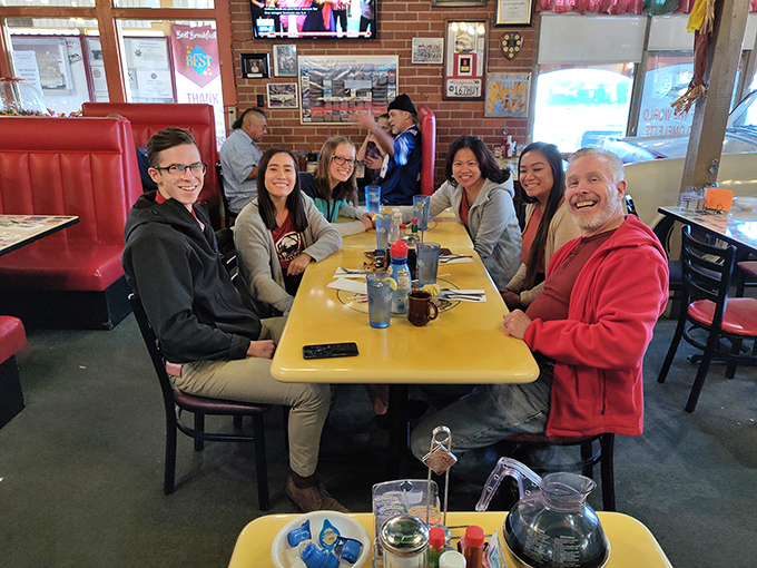 Happy faces around yellow tables&mdash;the universal sign that you've found a place where memories are made between bites of exceptional food.