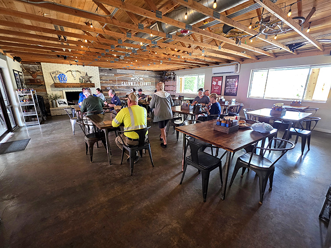 Fellow pilgrims on the BBQ journey, gathering in this temple of smoke. The yellow shirt guy definitely knows what he's doing.