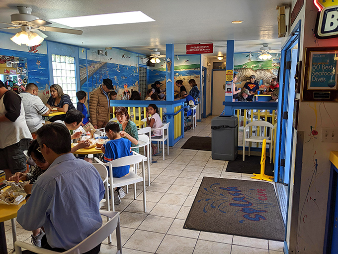 Families and food adventurers gather in this blue-hued dining room, where strangers become friends over shared chowder recommendations.
