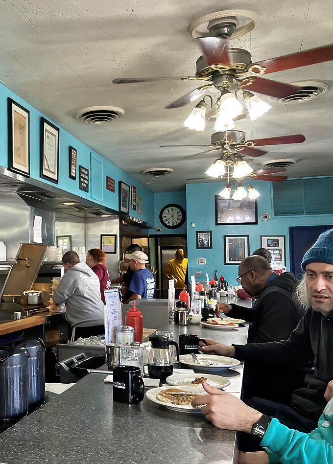 Morning communion at the counter, where regulars and newcomers alike bow their heads&mdash;not in prayer, but in devotion to perfectly cooked eggs and bacon.