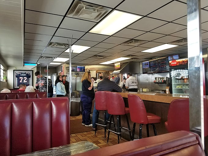 The lunch counter ballet: Where locals gather not just for sandwiches but for the comforting rhythm of small-town life.