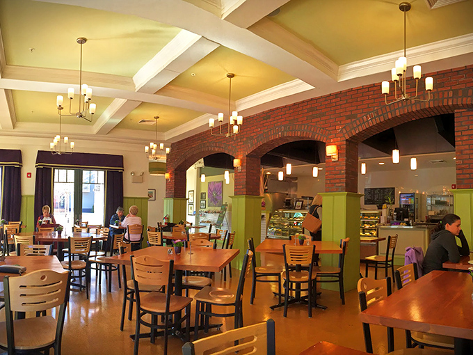 The dining room's warm wood and brick create that perfect "third place"&mdash;not home, not work, but somewhere you belong nonetheless.