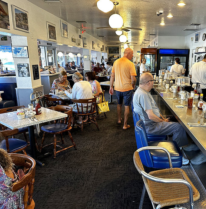 Where locals gather to start their day, exchange neighborhood news, and indulge in diner classics at the counter or cozy tables.