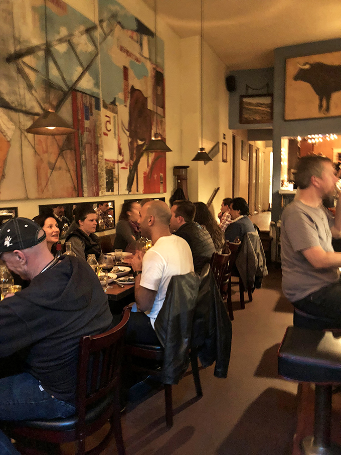 Where strangers become friends over shared plates and wine—the restaurant's buzzing energy is as nourishing as the food itself.
