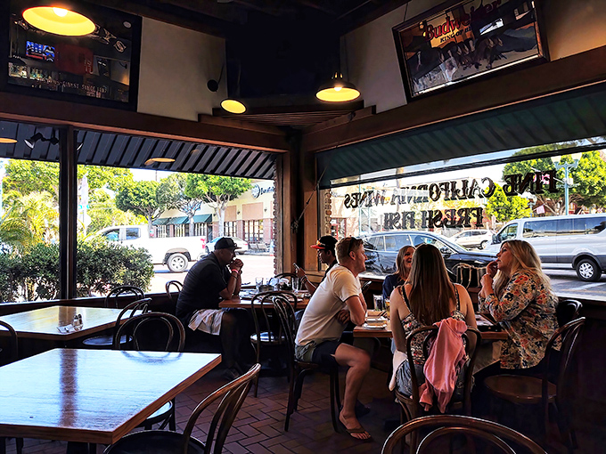 The front dining area offers prime people-watching through those big windows&mdash;because good food tastes even better with a side of Main Street ambiance.