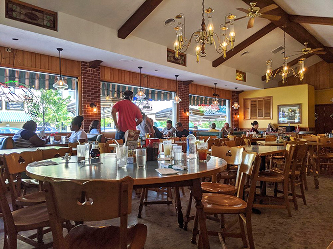 Morning light streams through the windows, illuminating a room where coffee flows freely and breakfast dreams come true.