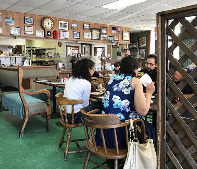 Conversations flow as freely as the coffee in these cozy nooks. The lattice dividers create the perfect balance of privacy and community.