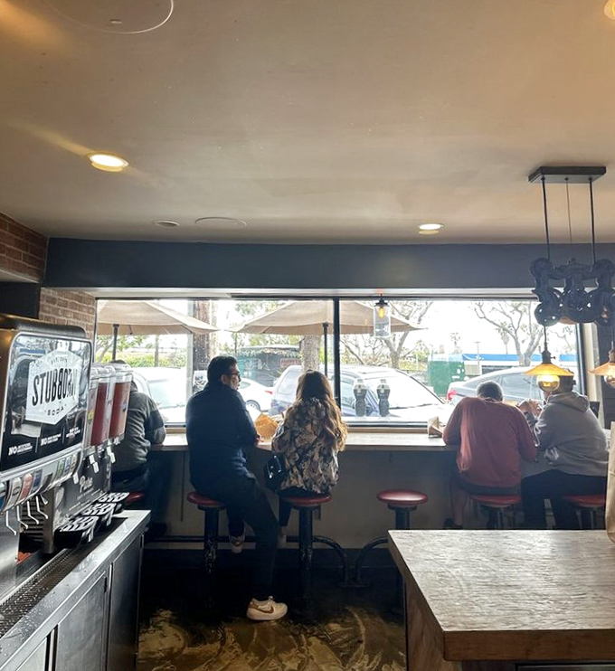 The window counter&mdash;where sandwich enthusiasts gather like scholars at a library of deliciousness, studying the art of perfect bites.