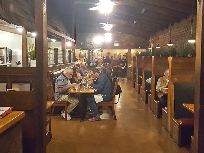 Where strangers become friends over mesquite smoke and shared appreciation for properly cooked protein. The universal language of "mmm."